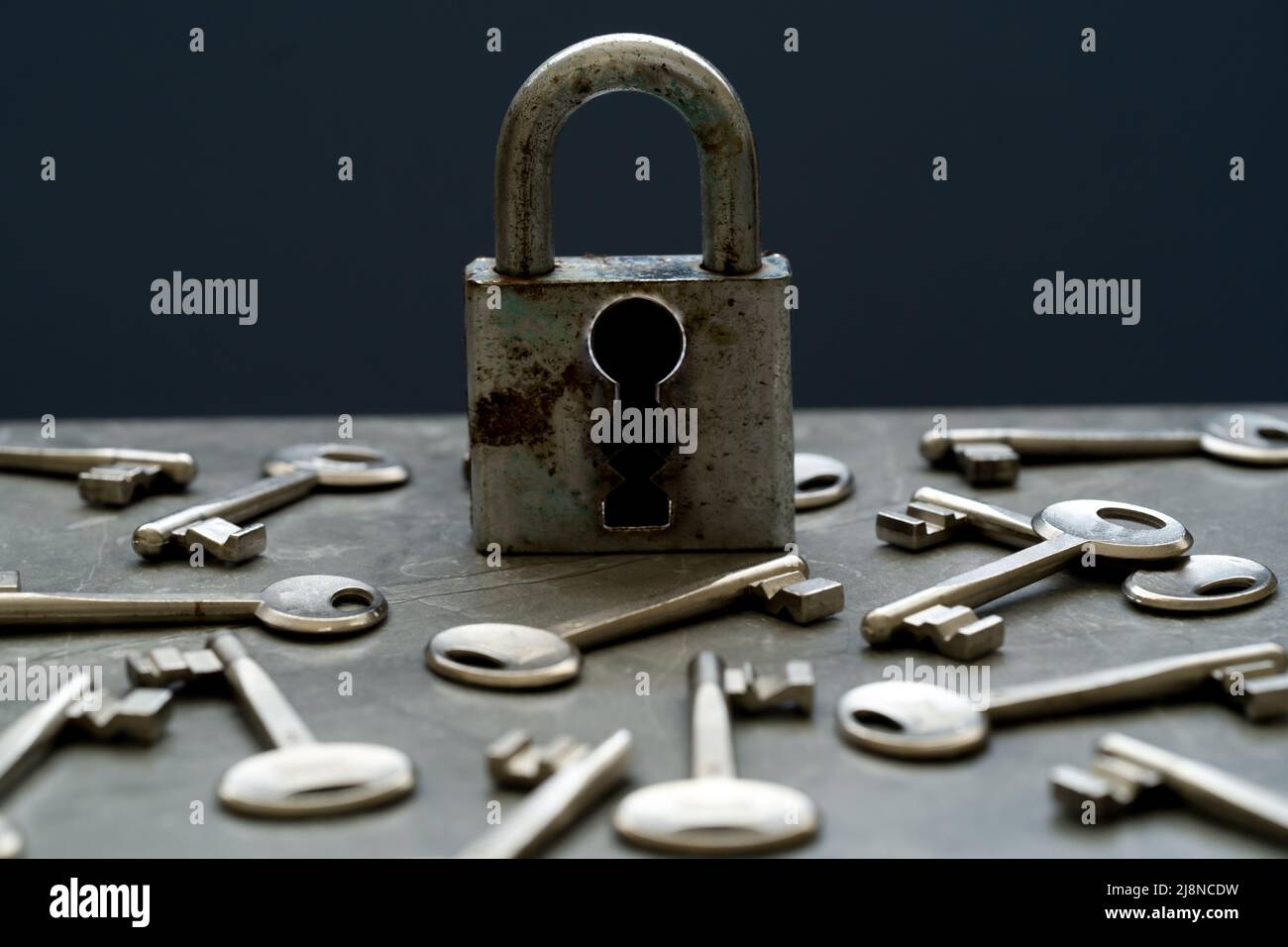 Lock and multiple keys on grey background. Concept of problem solving ...