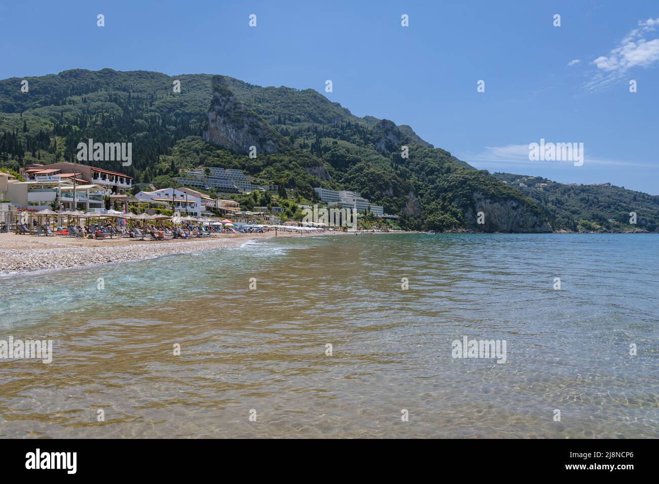 Ionian Sea beach in Agios Gordios town on a Greek Island of Corfu Stock Photo - Alamy