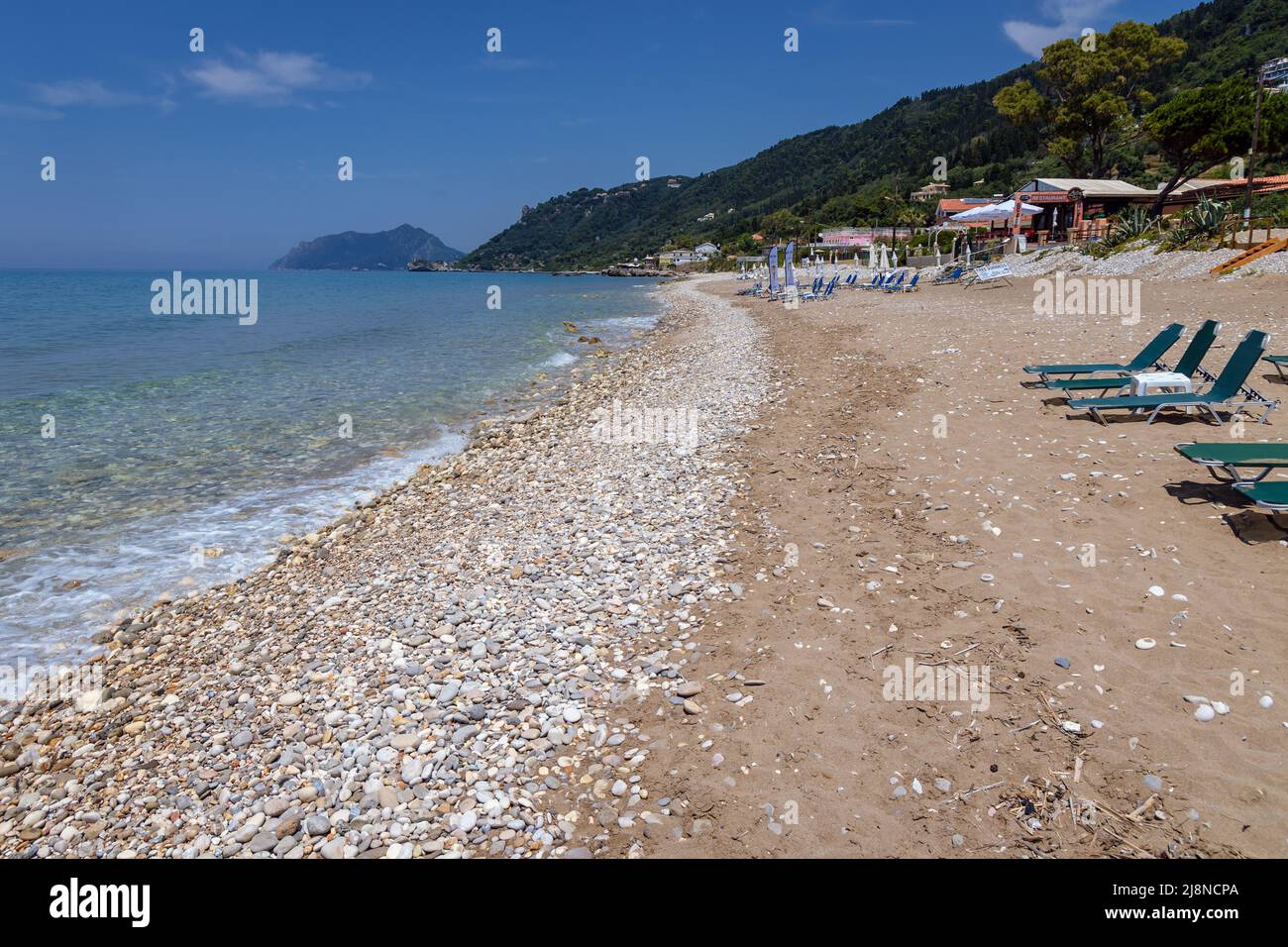 Ionian Sea beach in Agios Gordios town on a Greek Island of Corfu Stock Photo - Alamy