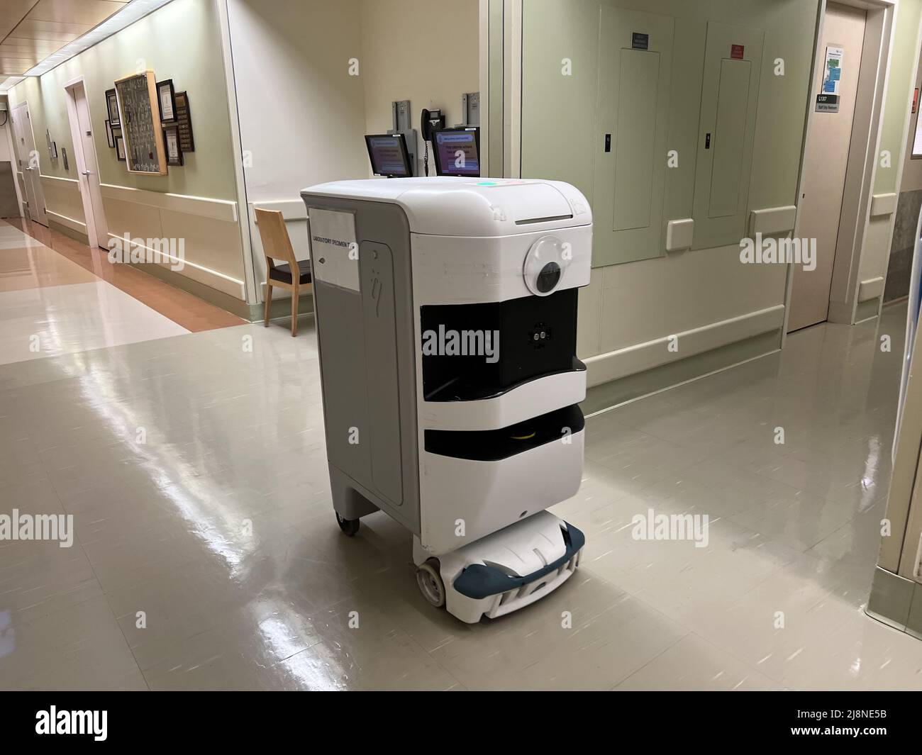 USA. 17th Mar, 2022. A robot delivers specimens for laboratory testing ...