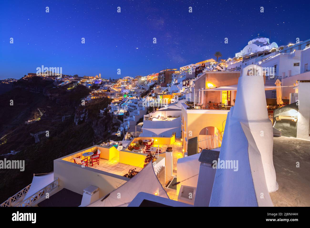 Fira town, with view of caldera, volcano and cruise ships, Santorini ...