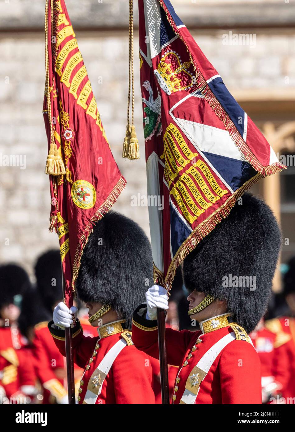 The new regimental colours of the 1st battalion Irish guards are paraded in the Quadrangle of ...