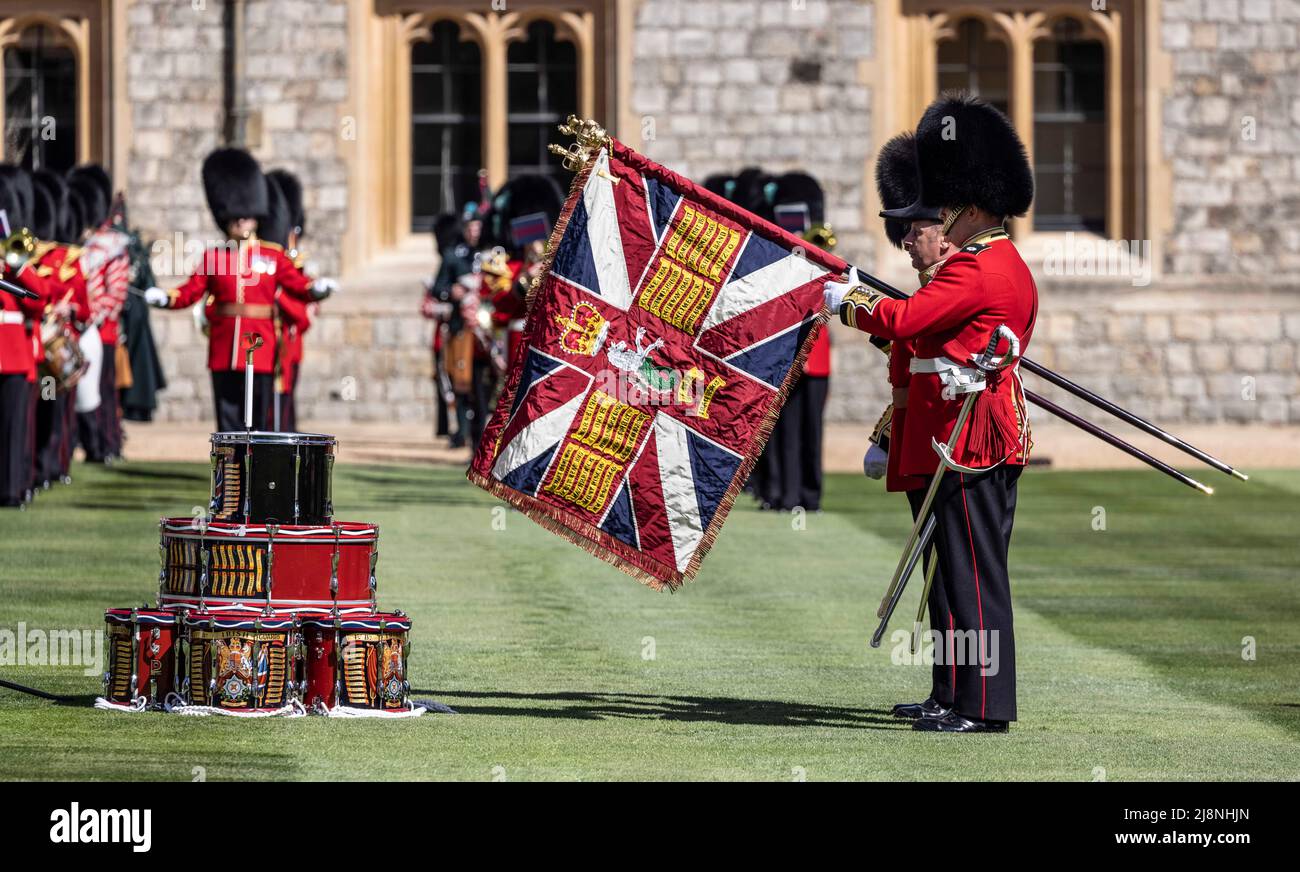 The new regimental colours of the 1st battalion Irish guards are paraded in the Quadrangle of ...