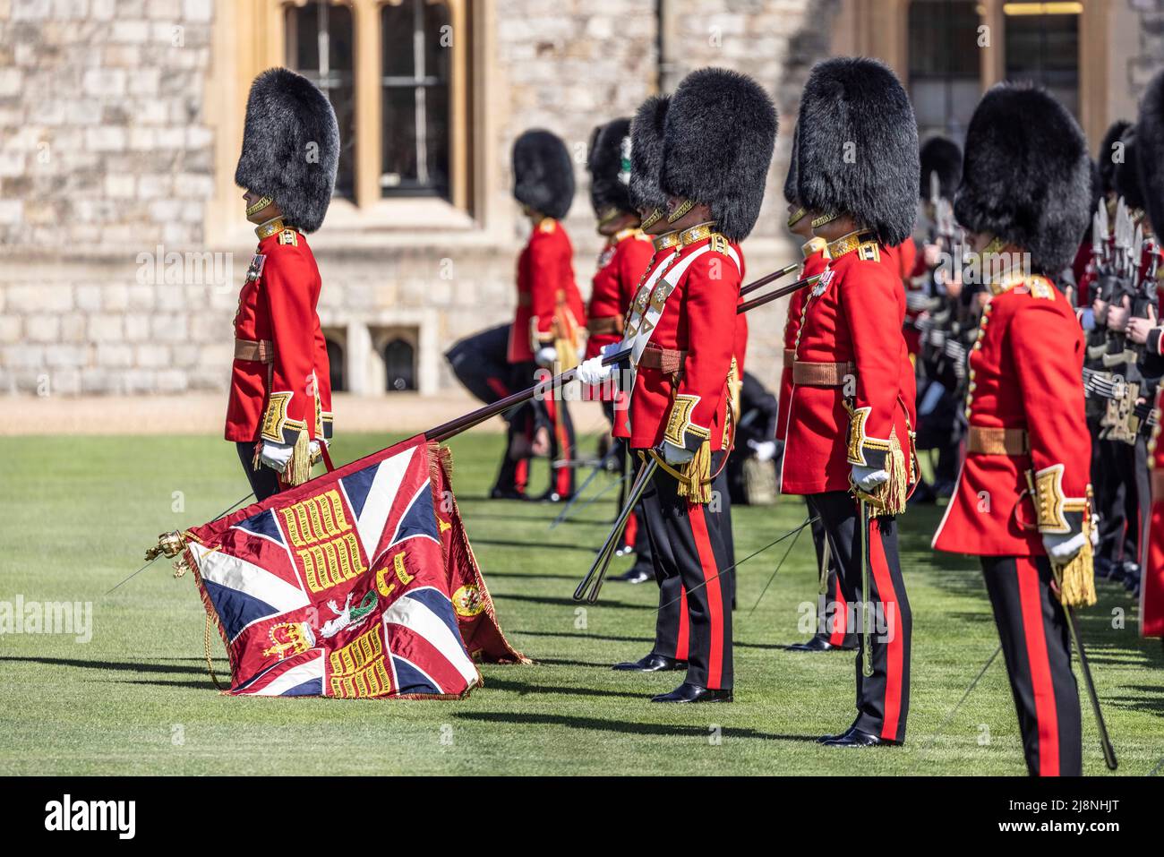 The new regimental colours of the 1st battalion Irish guards are paraded in the Quadrangle of ...