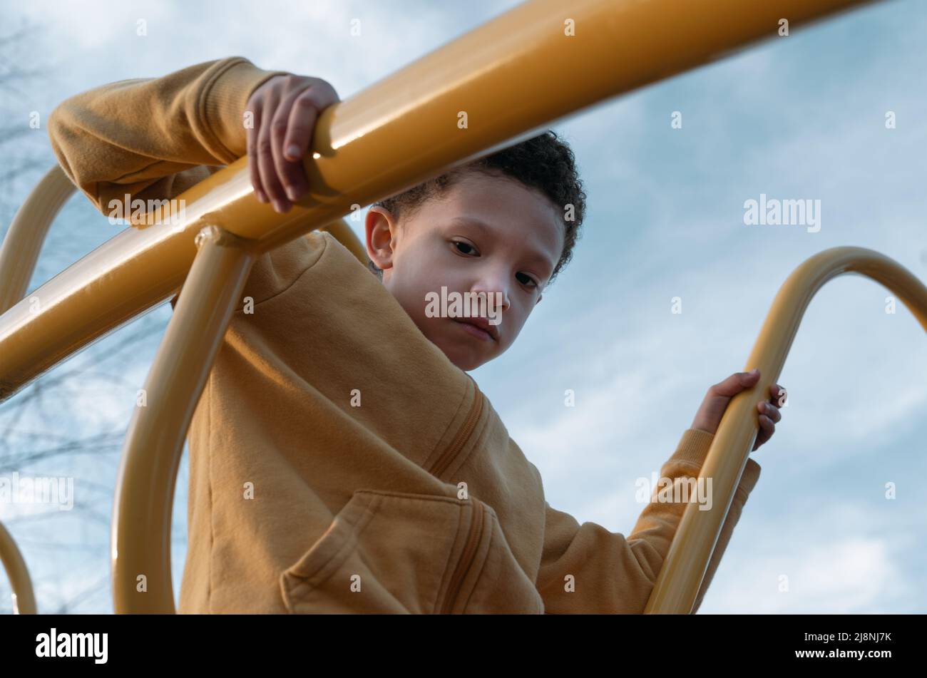 Child Alone In Playground
