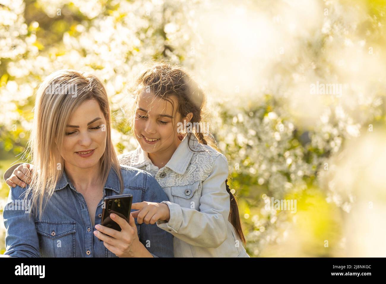 Family electronic gadgets child hi-res stock photography and images - Alamy