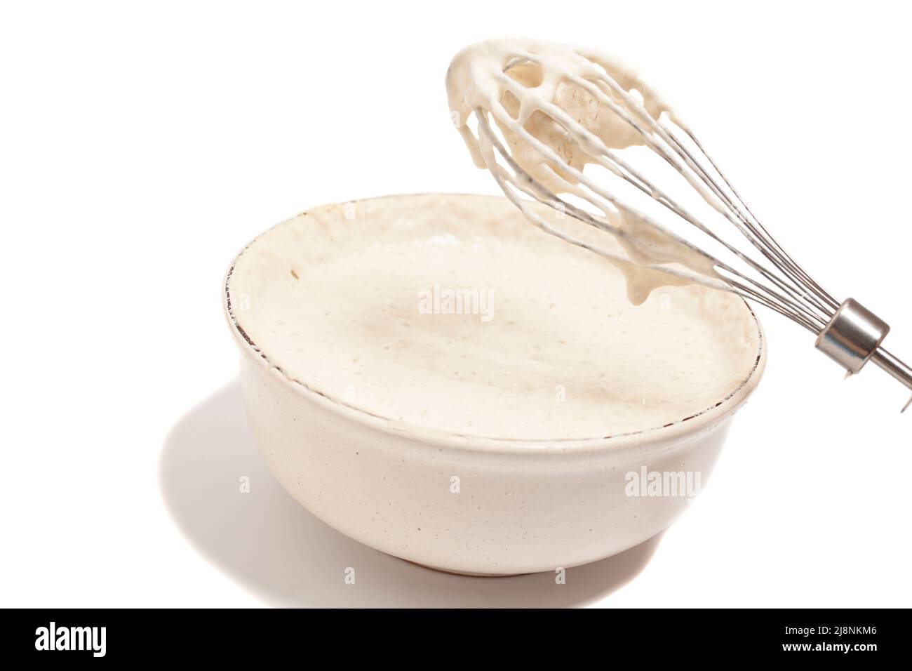 Mixing baking ingredients isolated on white background Stock Photo - Alamy
