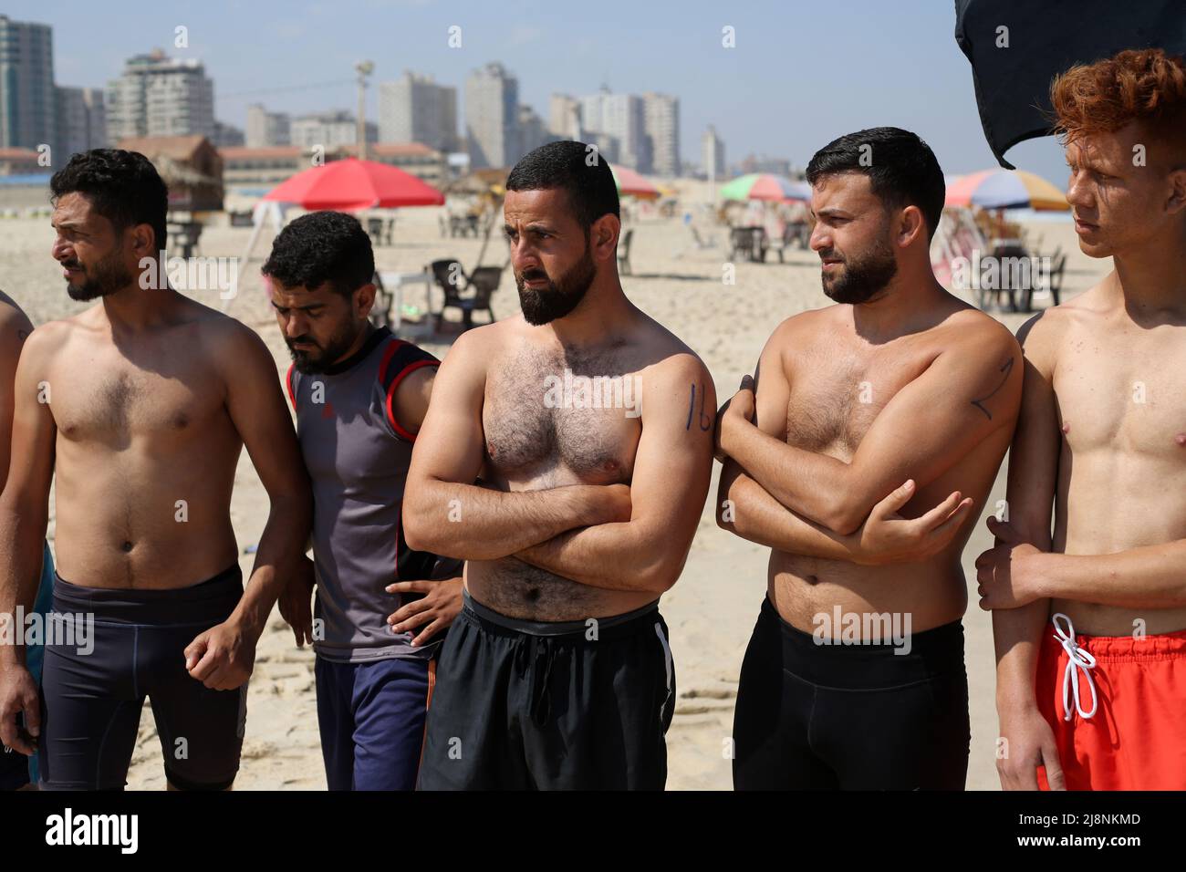 Palestinians take part in a swimming lifeguard course on the beach of ...