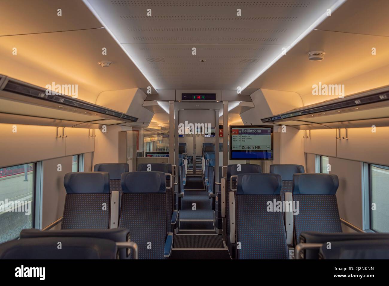 Interior of passenger switzerland train with blue comfortable seat ...