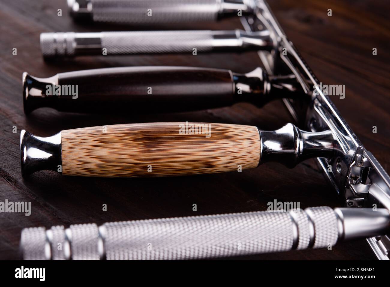 Set of razors on wooden background Stock Photo - Alamy