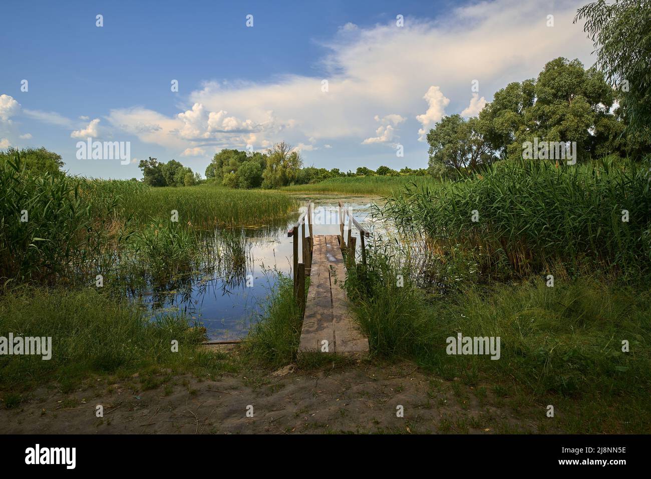 landscape with small bridge on a lake in Ukraine Stock Photo - Alamy