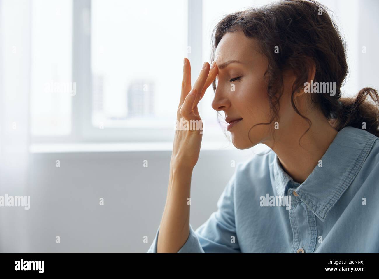 Offended angry curly haired woman business lady office worker tired of ...