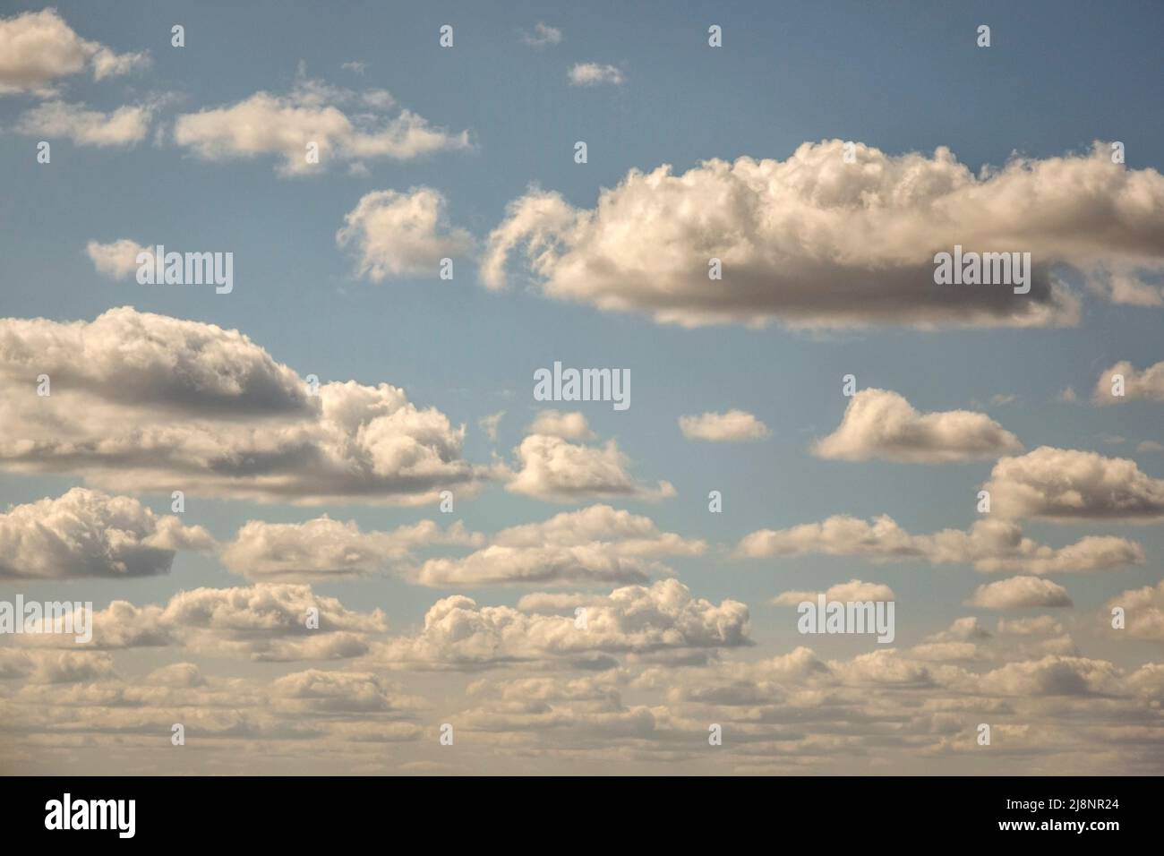 Blue sky background with snow-white cumulus clouds. Nature landscape ...