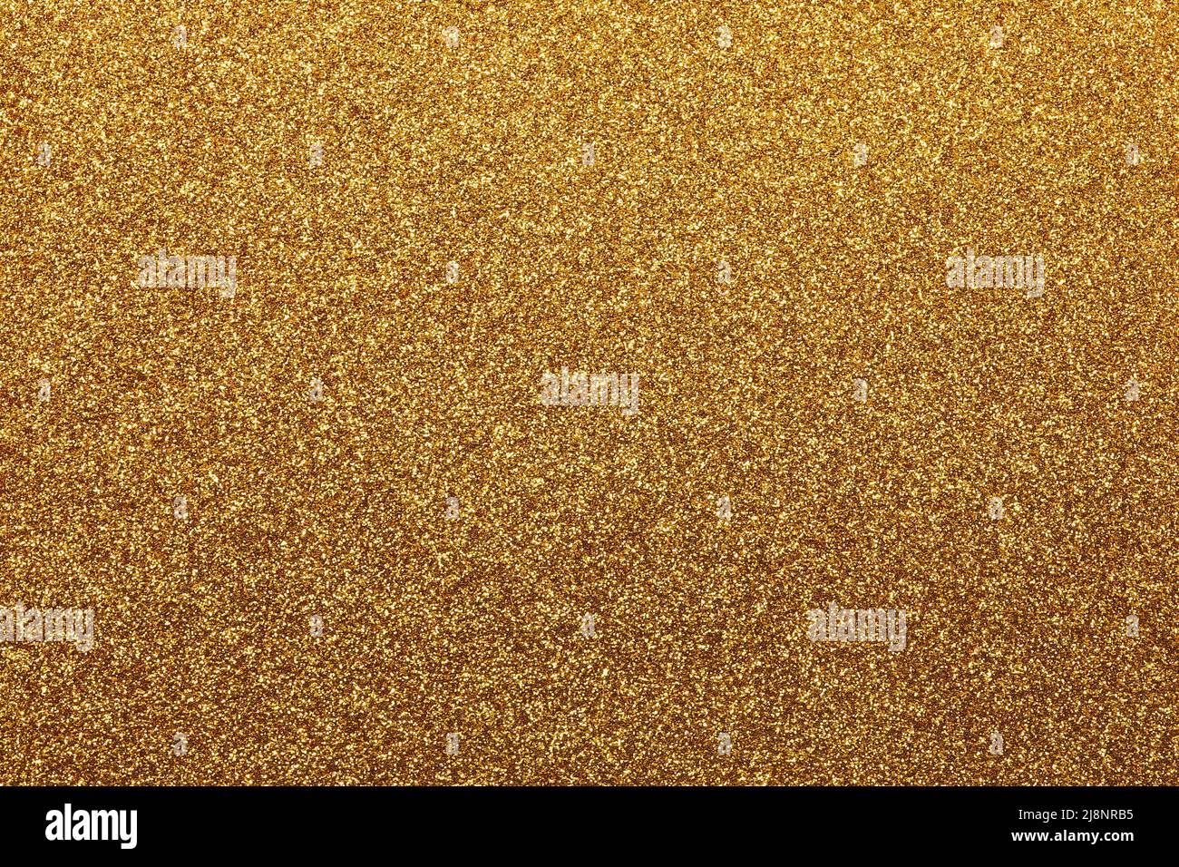 glitter shimmering background of deep Yellow Golden color that can be ...