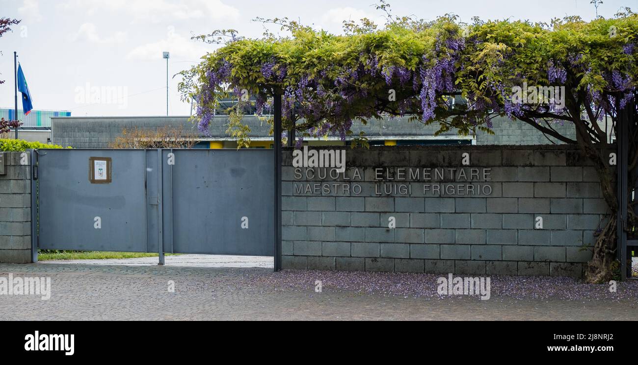 Lombardia, Italy - 05.01.2022: School building gate in northern Italy ...