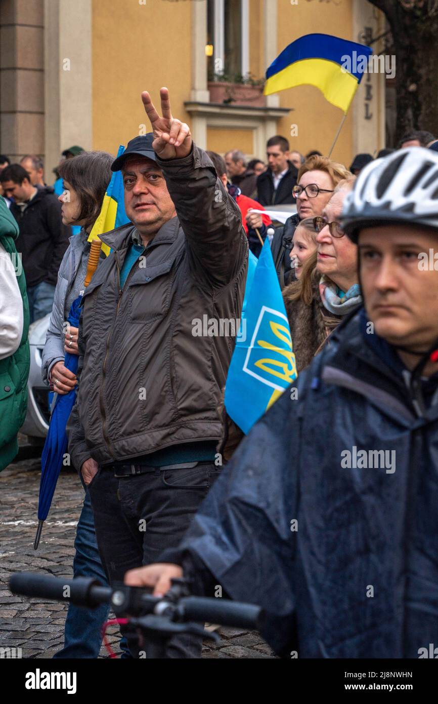 Sofia, Bulgaria - April 09, 2022: A man walks in a crowd among the ...