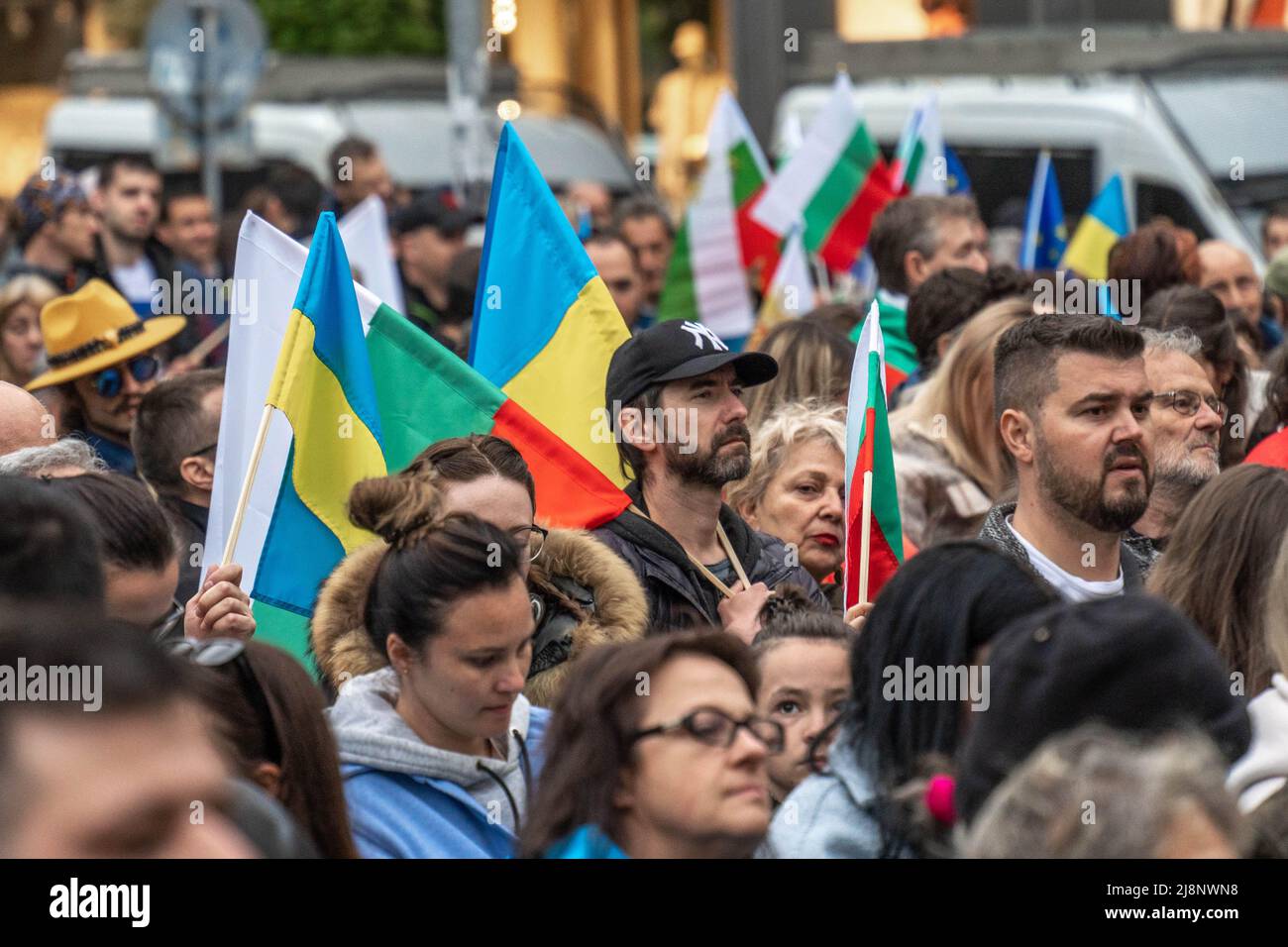 Sofia, Bulgaria - April 28, 2022: A man in stands in a crowd with ...