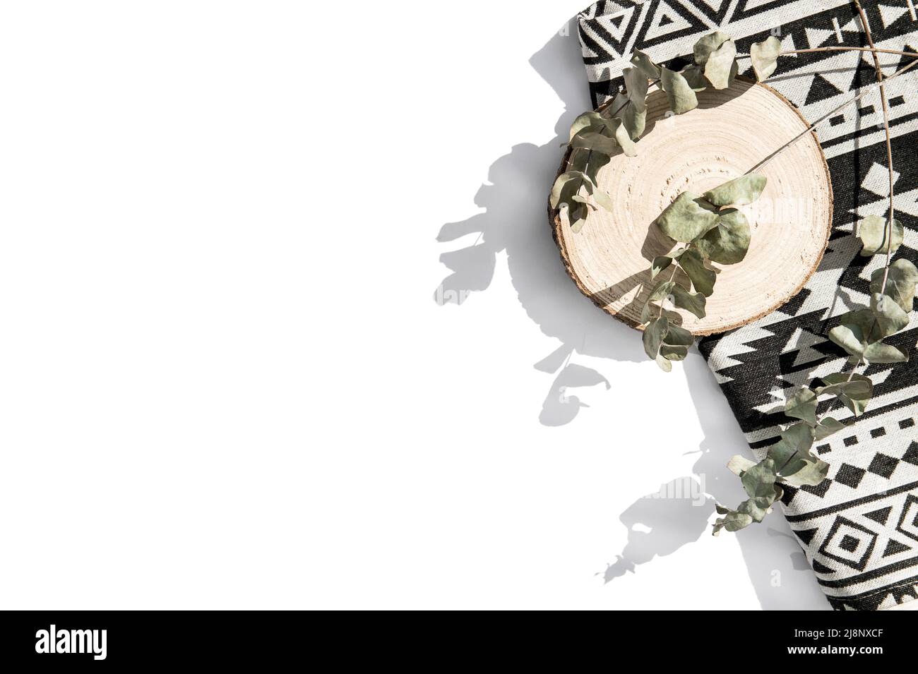 Fashion flat lay template. Eucalyptus and wooden round Stock Photo - Alamy