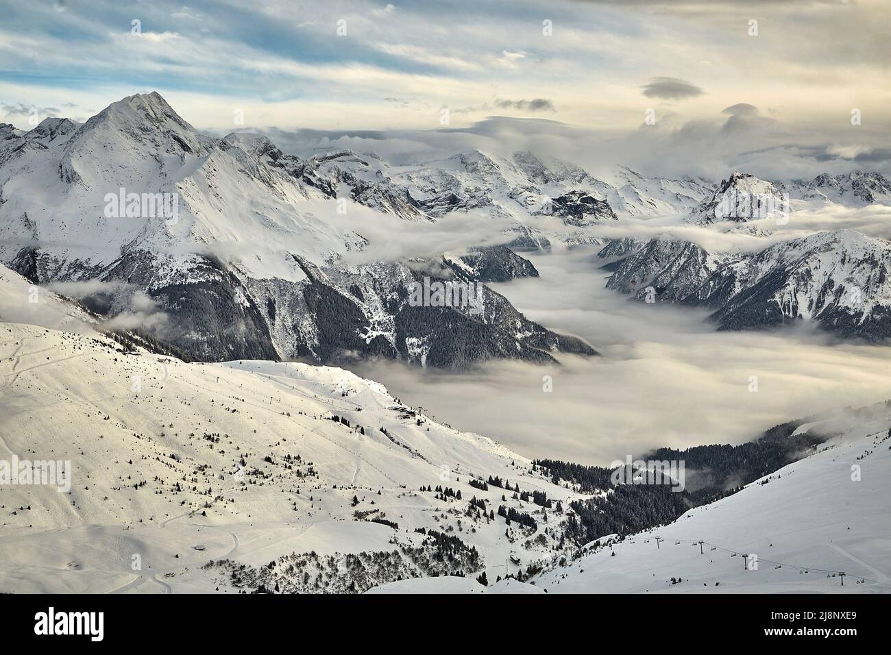 Mountain winter landscape above clouds Stock Photo - Alamy