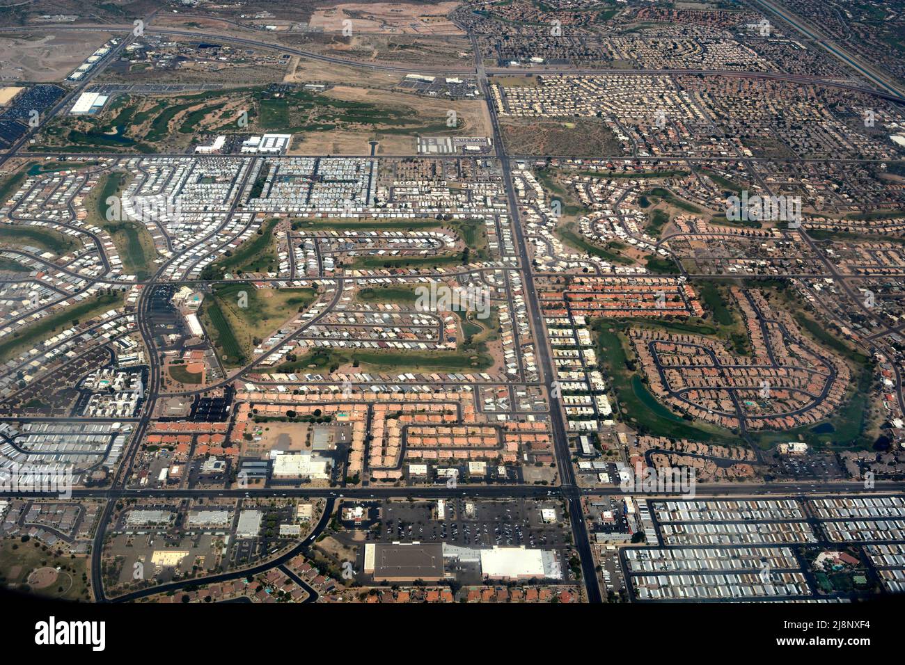 Aerial view of Mesa, Arizona housing developments and Painted Mountain ...