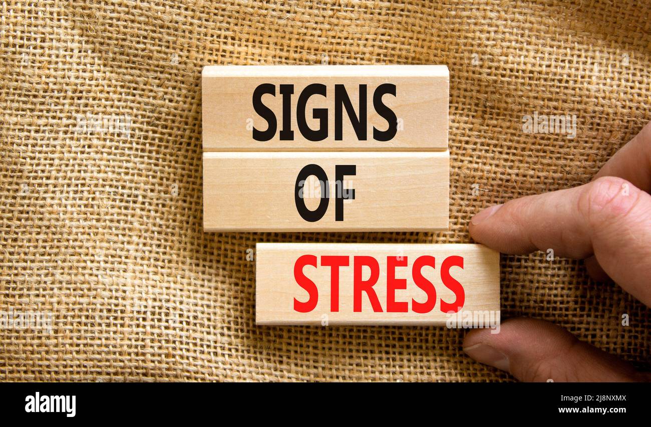 Signs of stress symbol. Concept words Signs of stress on wooden blocks ...