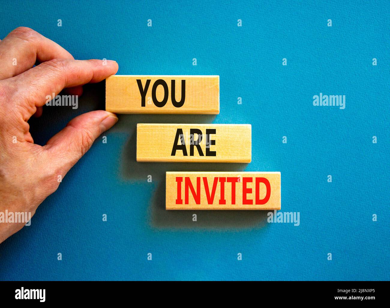 You are invited symbol. Concept words You are invited on wooden blocks ...