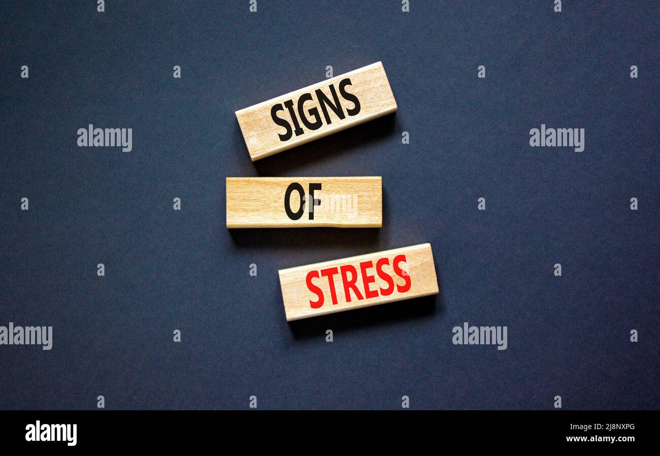 Signs of stress symbol. Concept words Signs of stress on wooden blocks ...
