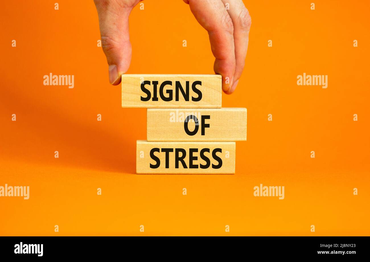 Signs of stress symbol. Concept words Signs of stress on wooden blocks ...