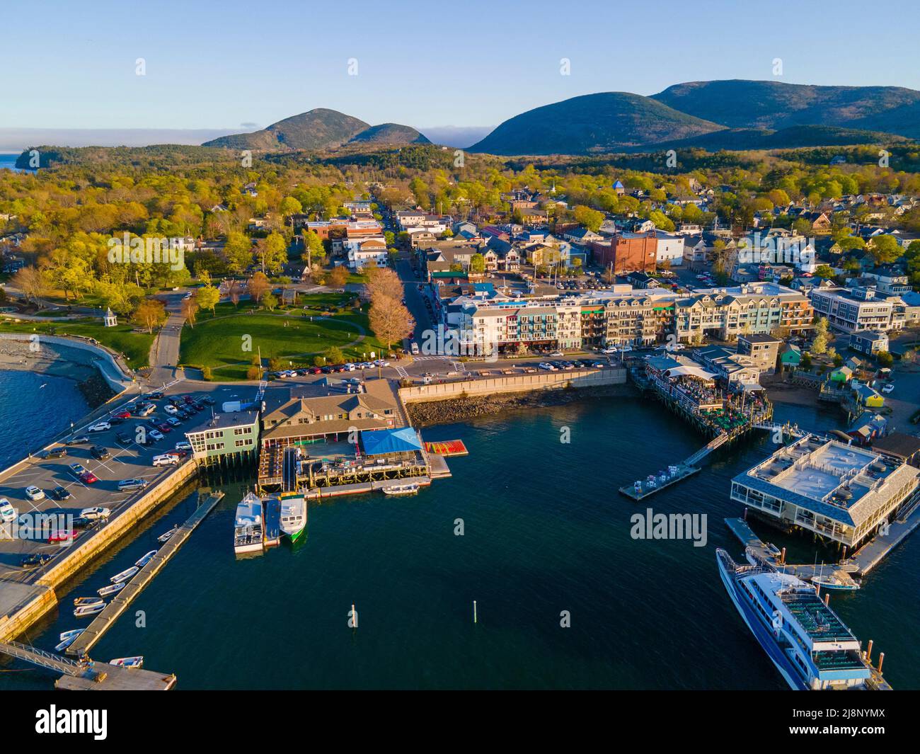 Bar Harbor historic town center aerial view at sunset, with Cadillac ...