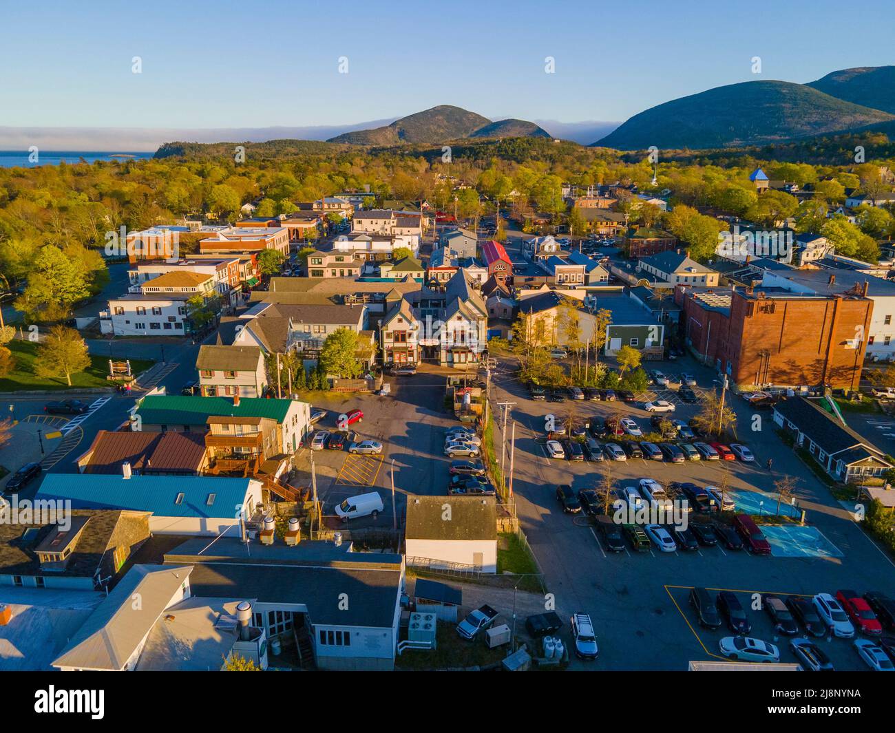Bar Harbor historic town center aerial view at sunset, with Cadillac ...