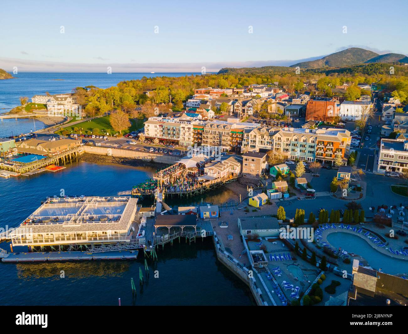 Bar Harbor historic town center aerial view at sunset, with Cadillac ...
