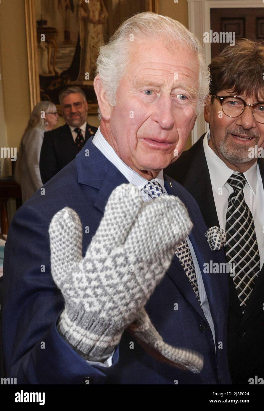 The Prince of Wales wearing a knitted glove and, His Honour Howard ...