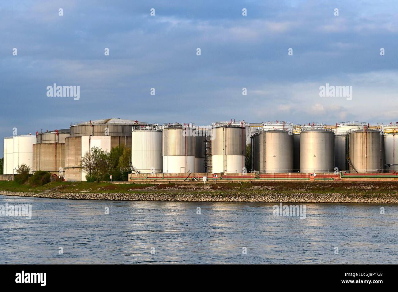 Mannheim, Germany - April 2022: Rows of oil storage tanks on the banks ...