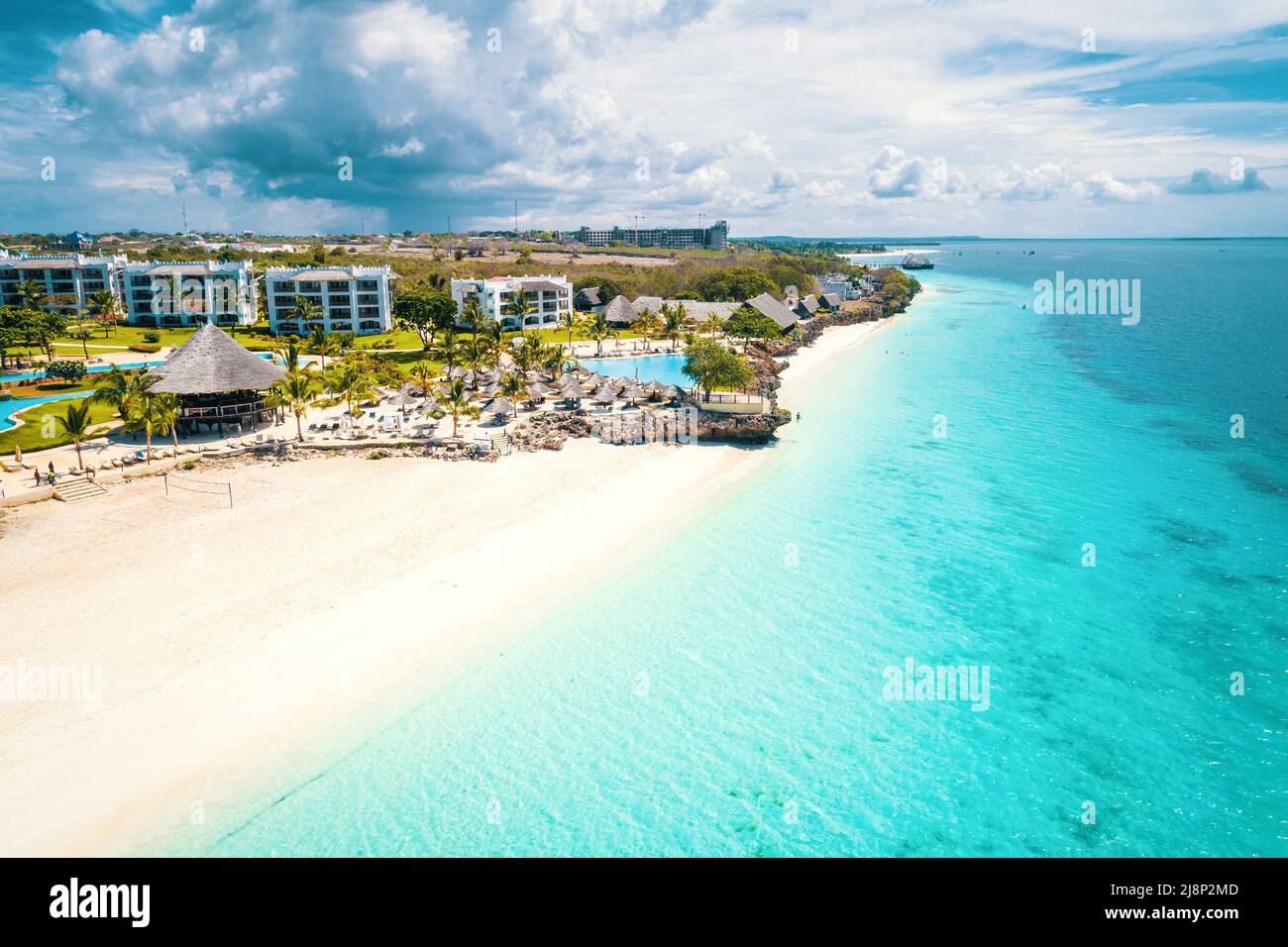 Aerial view of Nungwi beach in Zanzibar, Tanzania with luxury resort ...