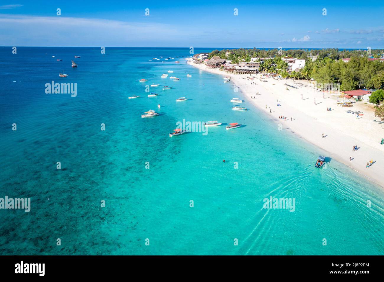Aerial view of Nungwi beach in Zanzibar, Tanzania with luxury resort ...
