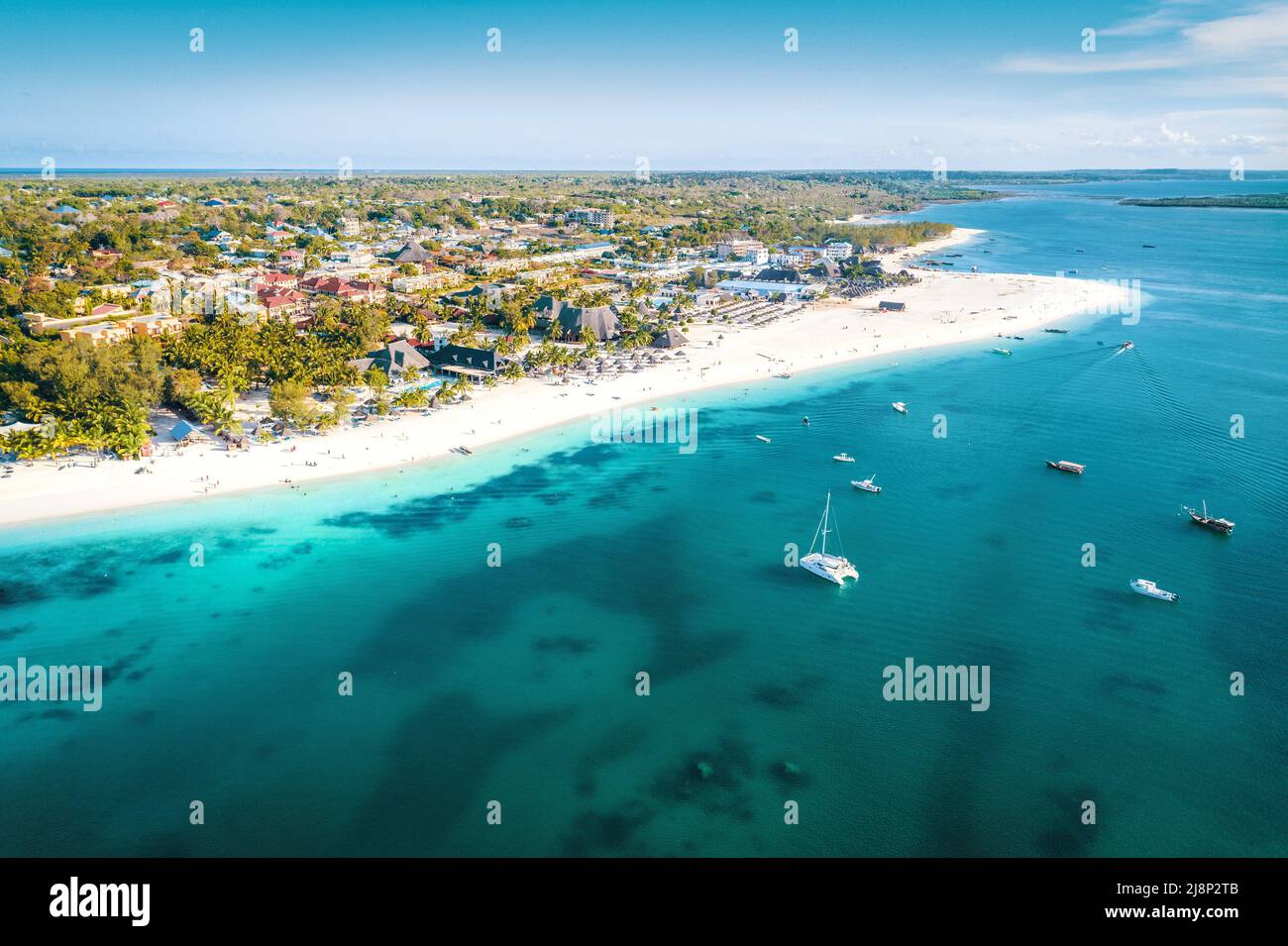 Aerial view of Nungwi beach in Zanzibar, Tanzania with luxury resort ...