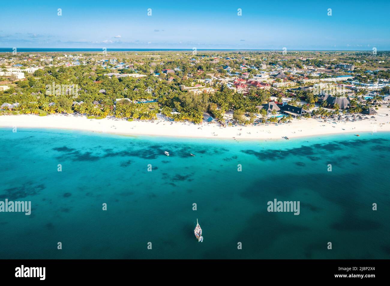 Aerial view of Nungwi beach in Zanzibar, Tanzania with luxury resort ...
