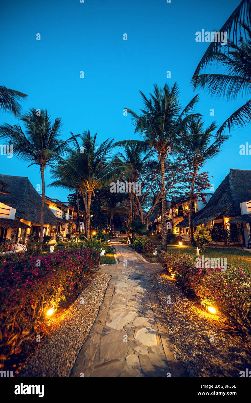 Tropical resort at evening on exotic island. Toned image Stock Photo ...
