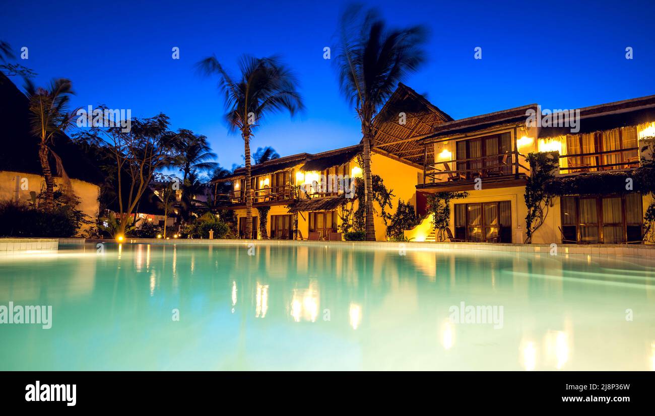 Tropical resort at evening on exotic island. Toned image Stock Photo ...