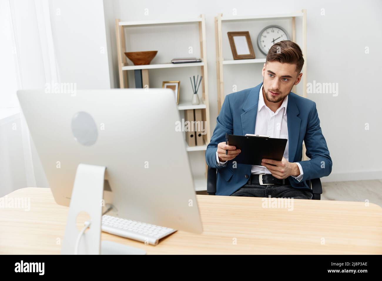 manager sitting at the computer work boss documentation executive Stock ...