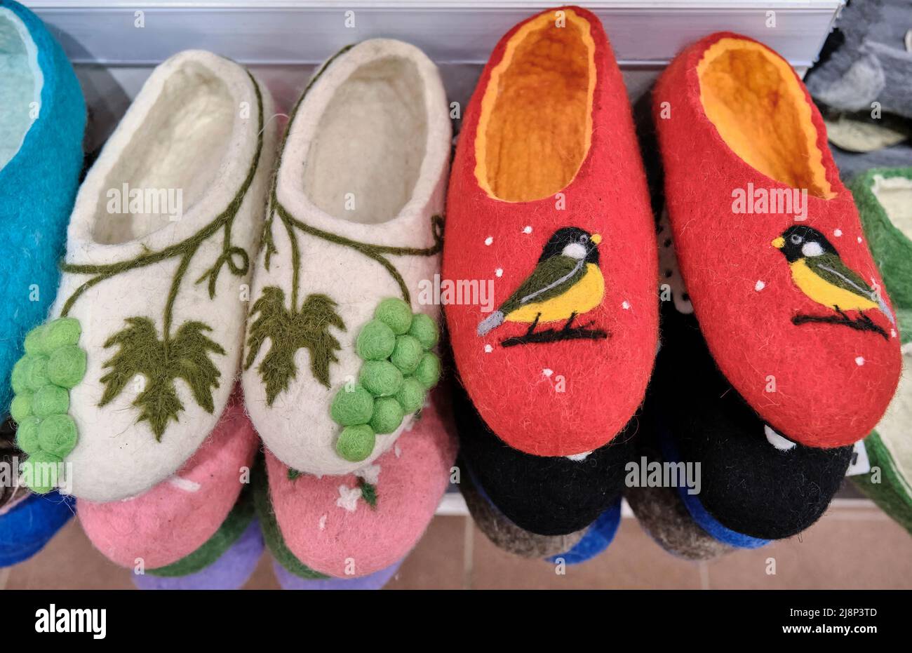 Bright colorful, with patterns in technique of dry felting, warm home ...