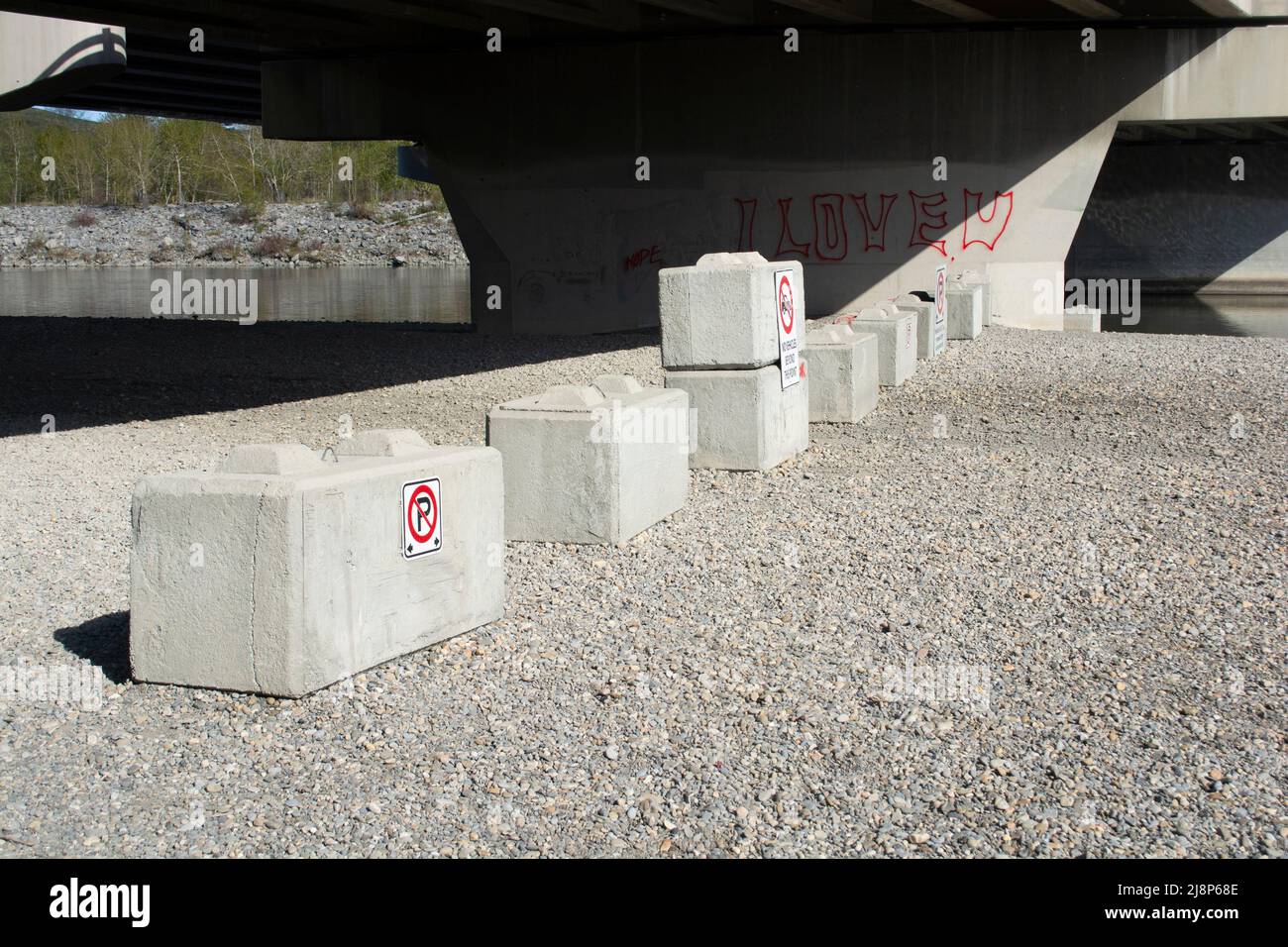 Cement Block Barriers at River Park - Overpass Stock Photo - Alamy