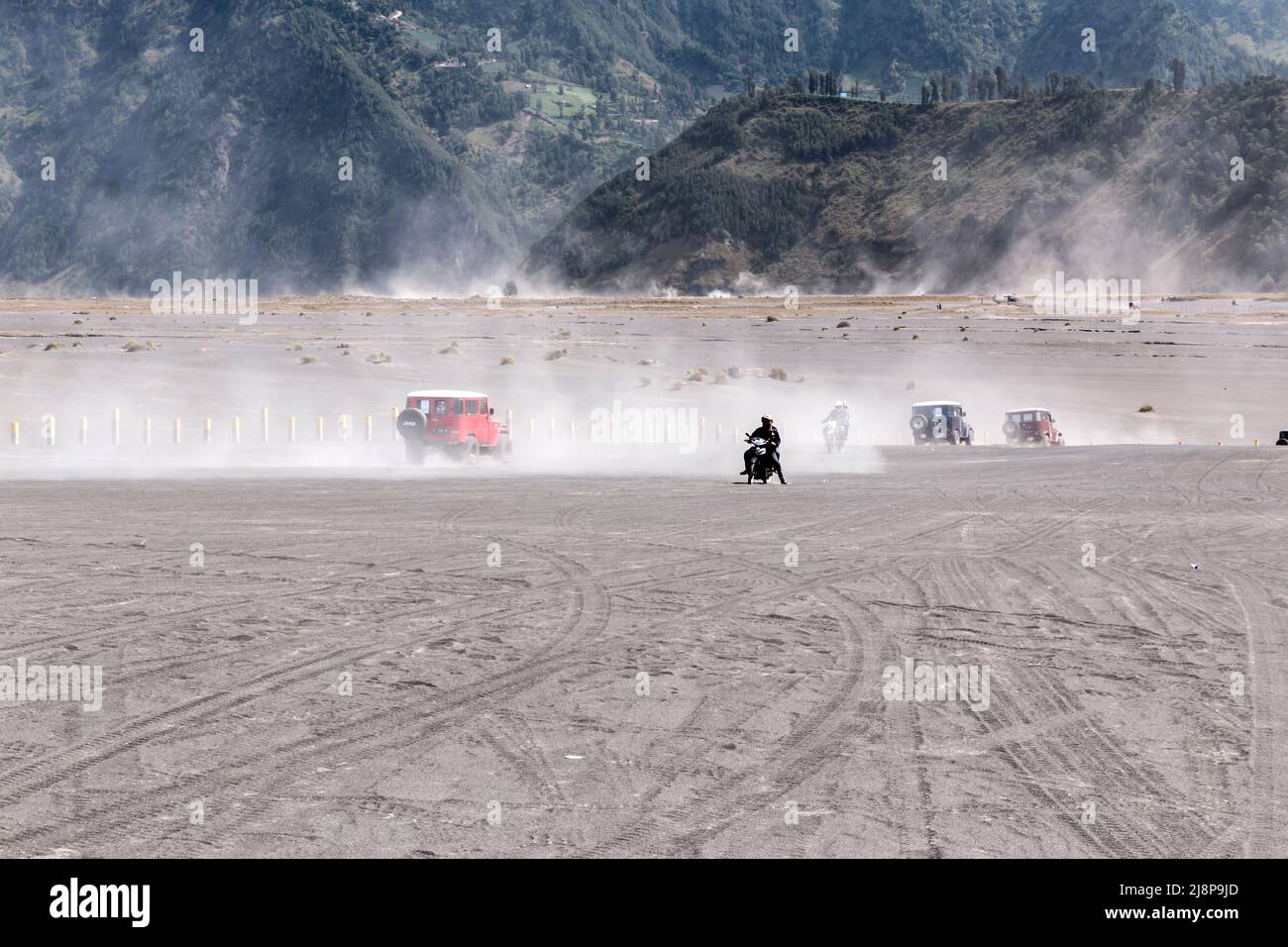 cars and motorcycles at the sand dune of Bromo mountain Stock Photo - Alamy