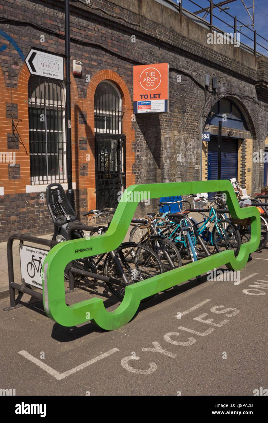 Small business and bicycle parking redeveloped under railway arches by ...