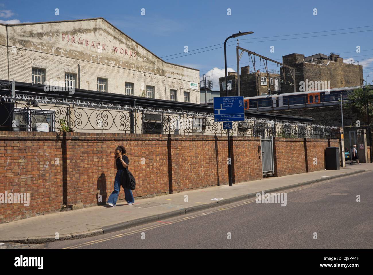 Small business redeveloped under railway arches by train and overground ...