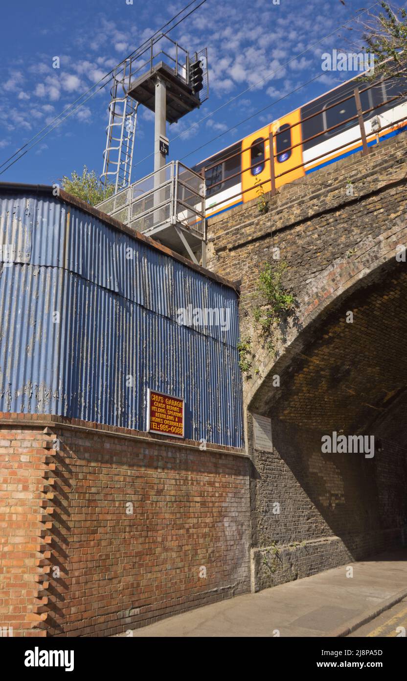 Small business redeveloped under railway arches by train and overground ...