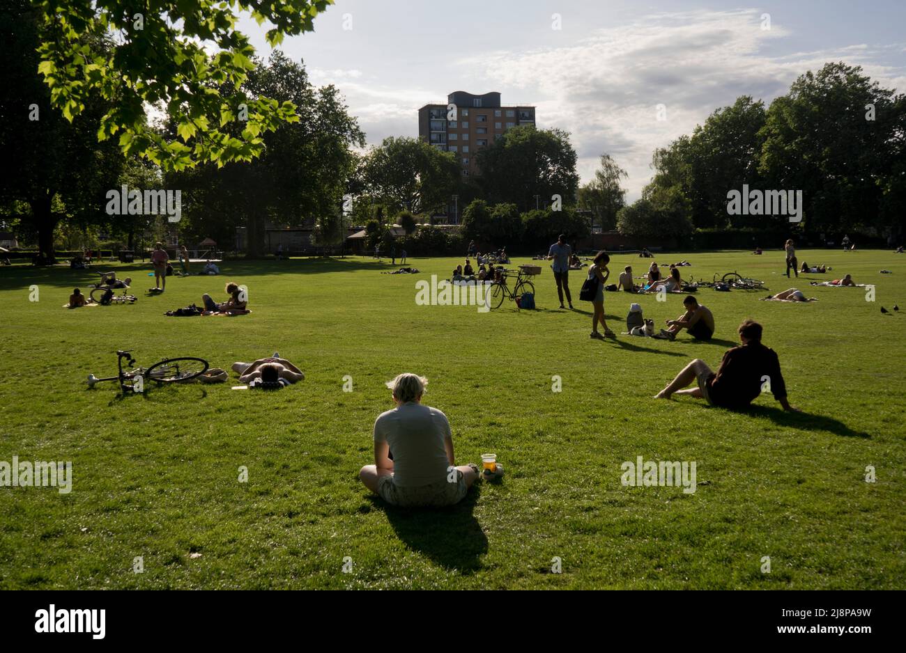 People enjoying spring sunshine in London Fields park in Hackney,London ...