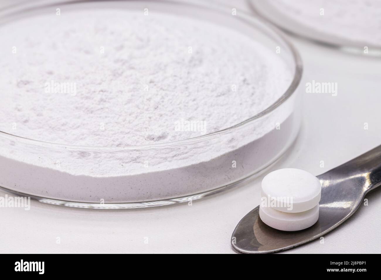 acetylsalicylic acid powder being produced in the laboratory, inside a ...