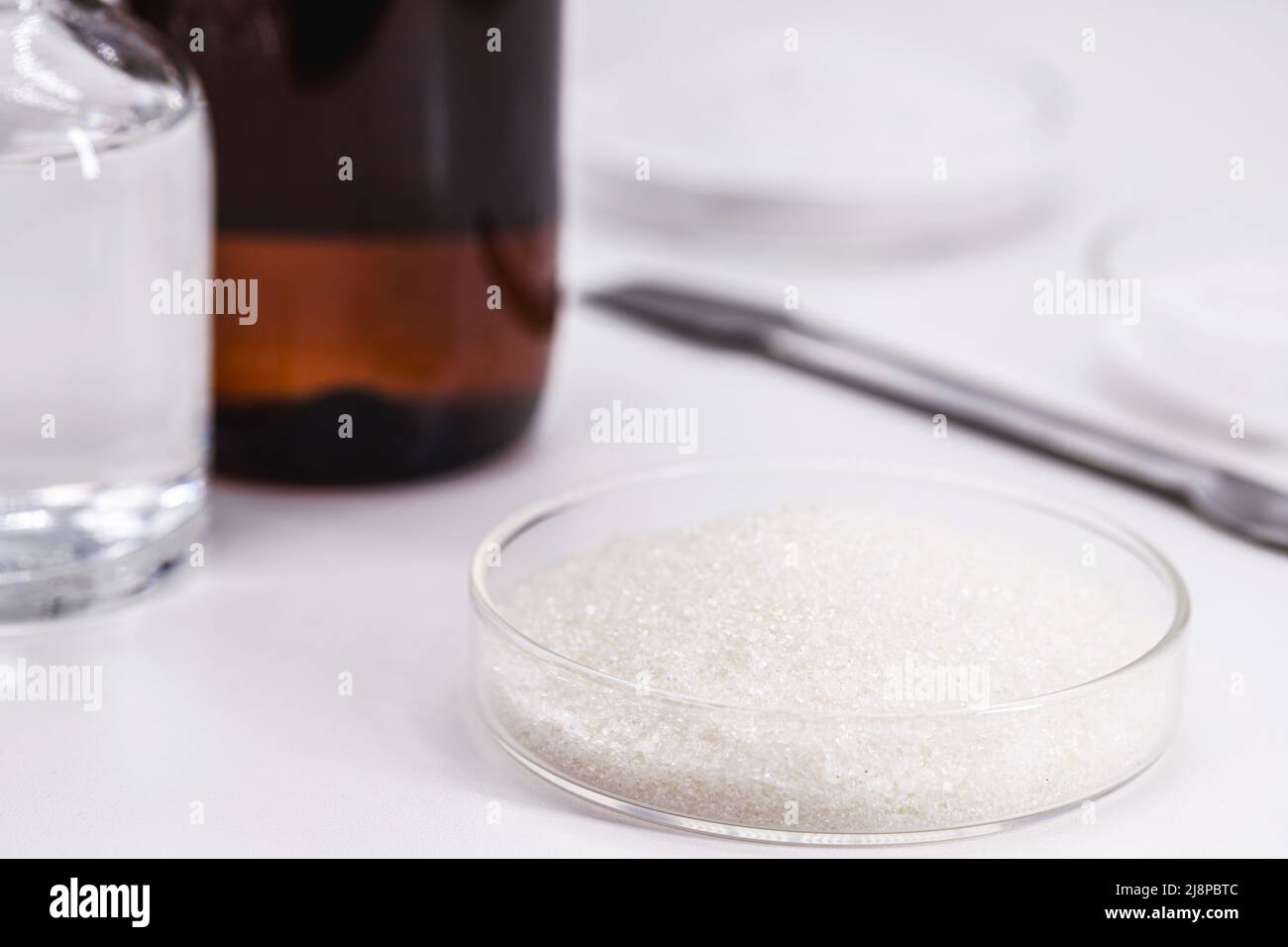 crystals of acetylsalicylic acid in petri dish, chemical component used ...