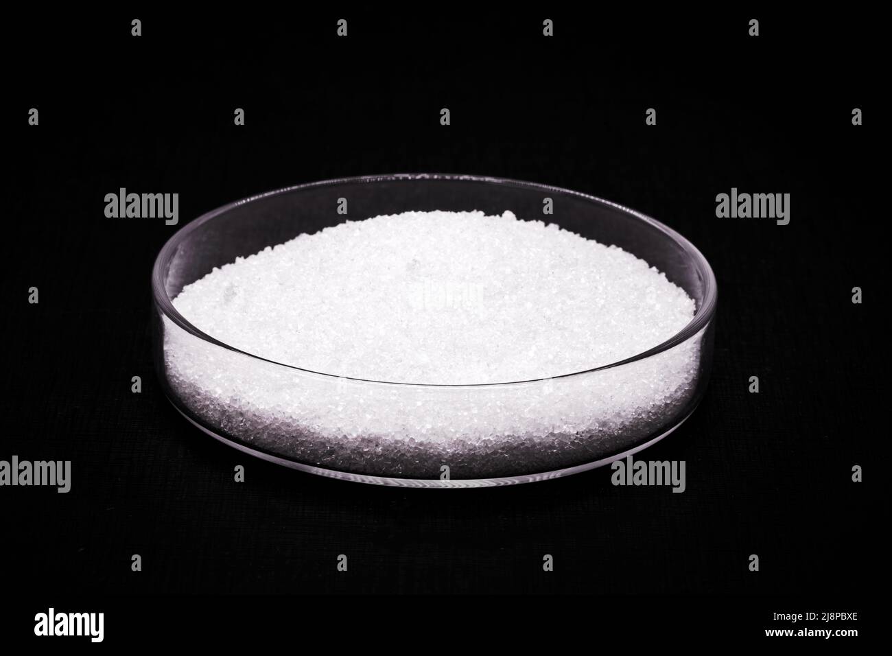 crystals of acetylsalicylic acid in petri dish, chemical component used ...